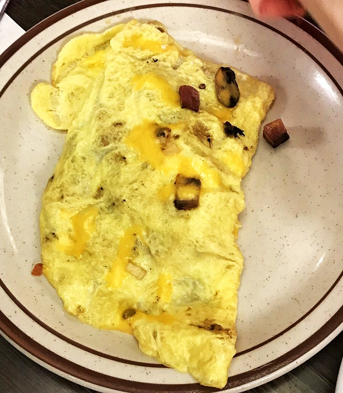 This omelet doesn't just contain ingredients&mdash;it embraces them in a fluffy yellow hug of breakfast perfection.
