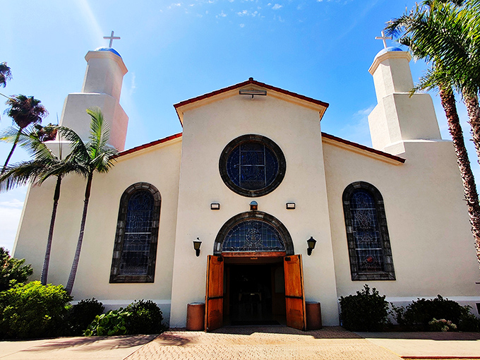 Our Lady of Guadalupe Church stands as both spiritual center and architectural gem, where community matters more than keeping up with the Joneses.