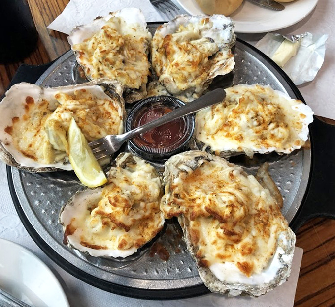 Oysters Rockefeller done right&mdash;these bivalves wear their creamy, cheesy topping like formal attire at a Chesapeake Bay gala.
