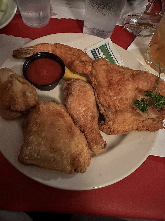 Pan-fried chicken that renders fast food chains irrelevant, with a golden crust protecting juicy meat that falls off the bone.