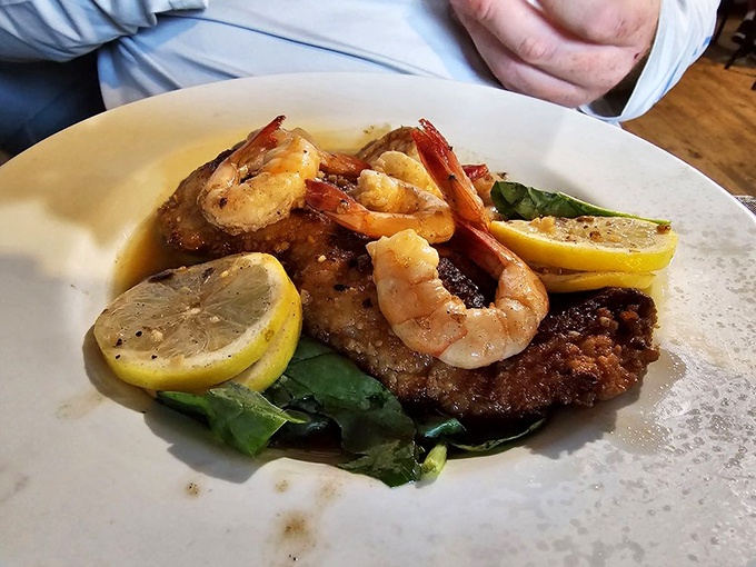 This pan-fried grouper with shrimp on top is what fish dreams of becoming when it grows up. Lemon adds the perfect zing.