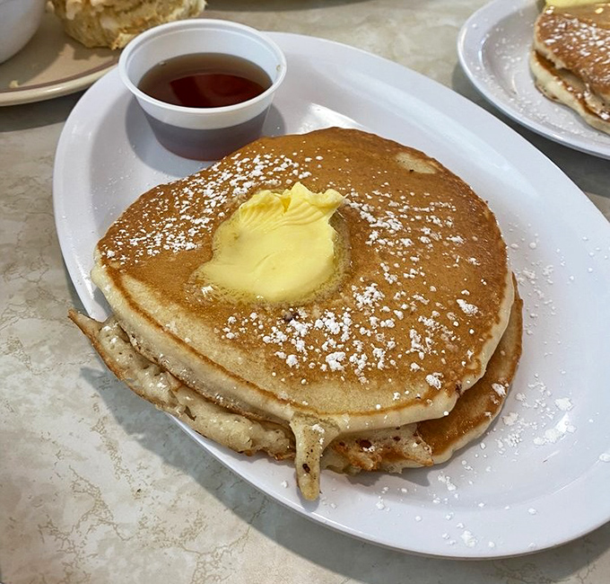 Pancakes that don't need Instagram filters&mdash;just butter melting into that perfect golden surface and a light snowfall of powdered sugar.