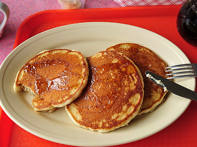 Pancakes so perfectly golden they could make IHOP executives weep with envy. Breakfast doesn't get more honest than this.