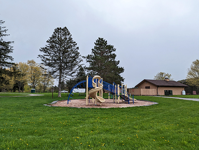 Kid-approved wilderness! This playground offers the perfect energy release between hiking adventures and marshmallow roasting sessions.