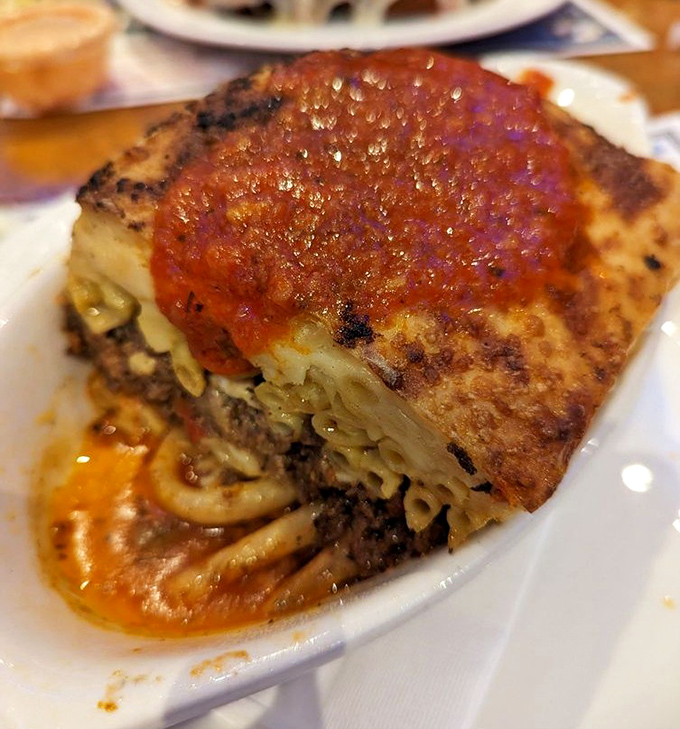 Layers of pasta, meat sauce, and b&eacute;chamel create this pastichio&mdash;like lasagna that went to finishing school in Athens and came back with stories to tell.