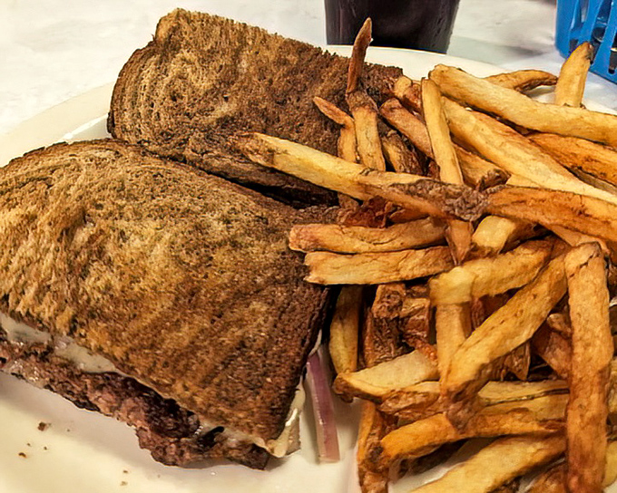 A proper patty melt should require both hands and several napkins. This beauty delivers on that sacred promise.