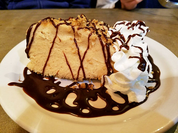This peanut butter pie isn't just dessert&mdash;it's therapy on a plate, with chocolate drizzle providing the perfect closing argument.