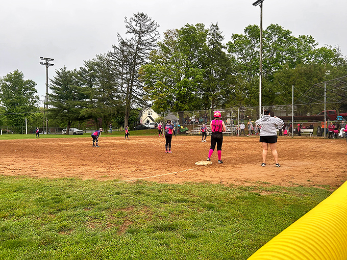 Saturday softball brings the community together in a timeless ritual of friendly competition, cheers, and the occasional disputed call.