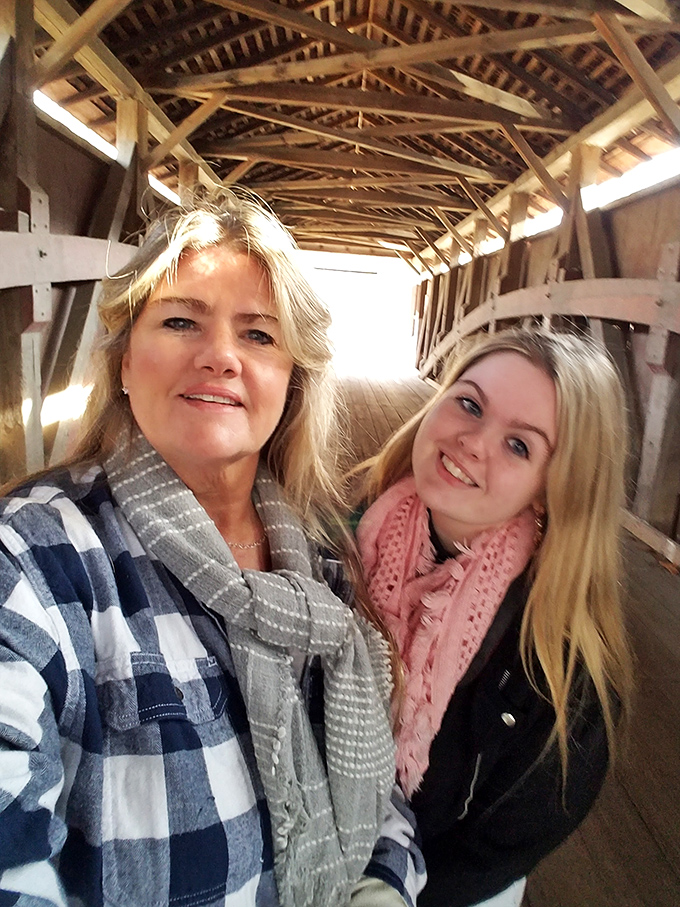 Inside the bridge, visitors often pause to appreciate the intricate wooden framework that has withstood centuries of Pennsylvania weather.