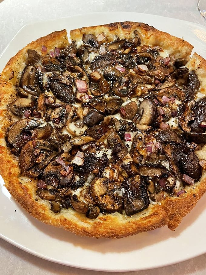 This mushroom pizza isn't playing around&mdash;it's a fungi festival with caramelized edges that'll make you forget all other pizzas exist.