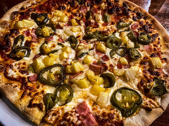 Hawaiian pizza done right&mdash;the sweet pineapple and salty ham creating that perfect flavor tango that pizza purists pretend not to love (but secretly do).