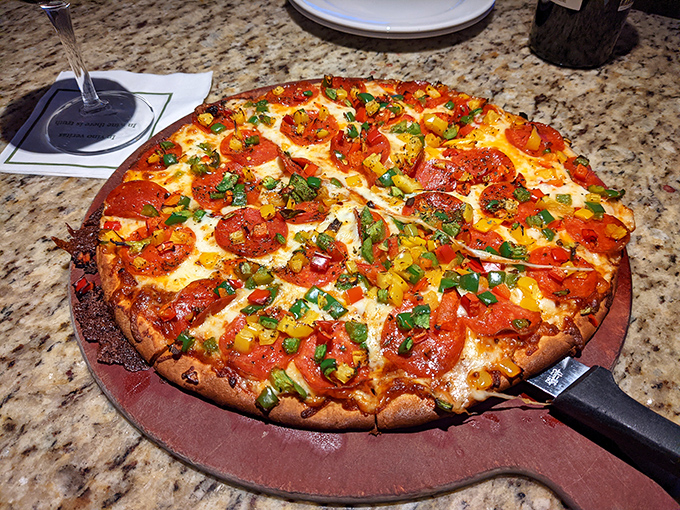 Pizza that refuses to be upstaged by pasta. Those peppers and pepperoni create a symphony of flavors that would make any Italian grandmother nod approvingly.