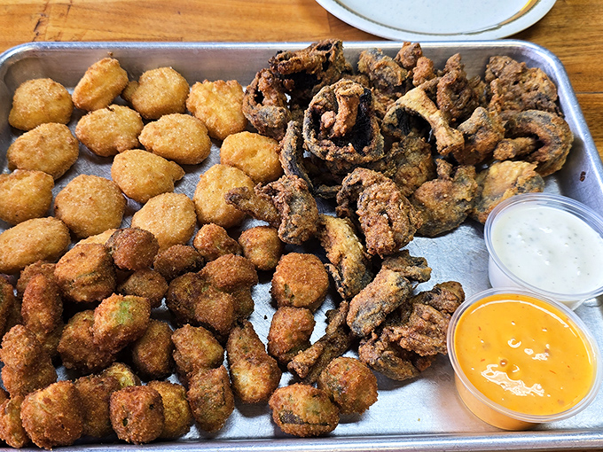 This platter of golden-fried goodness isn't just appetizers&mdash;it's a support group for people who believe calories don't count during vacation.