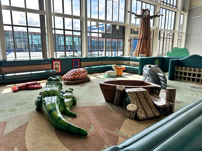This whimsical children's area featuring colorful alligators transforms shopping breaks into bayou adventures for the little ones.
