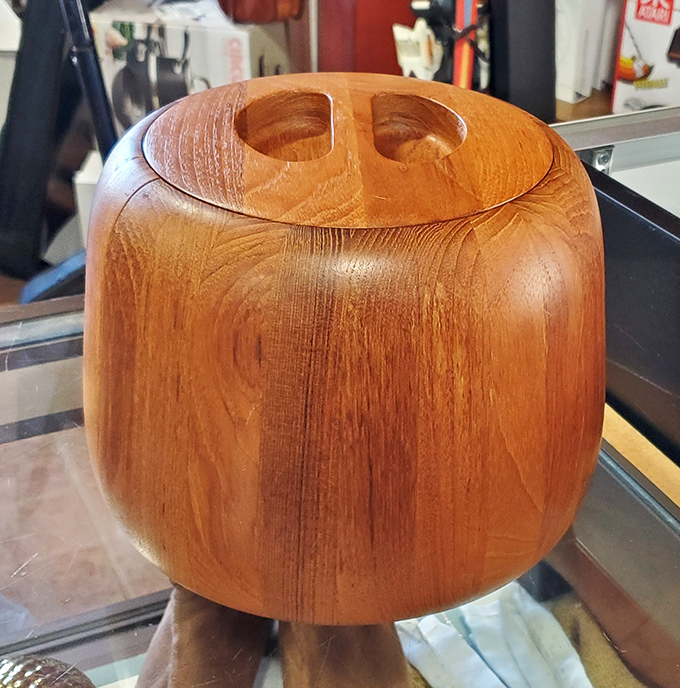 This wooden masterpiece looks like it belongs in a museum, not a thrift store. Someone's craft project or ancient artifact?