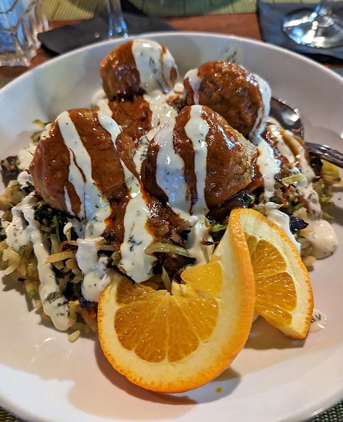 These meatballs, drizzled with sauce and served with orange slices, aren't just food&mdash;they're edible proof that someone in the kitchen cares.