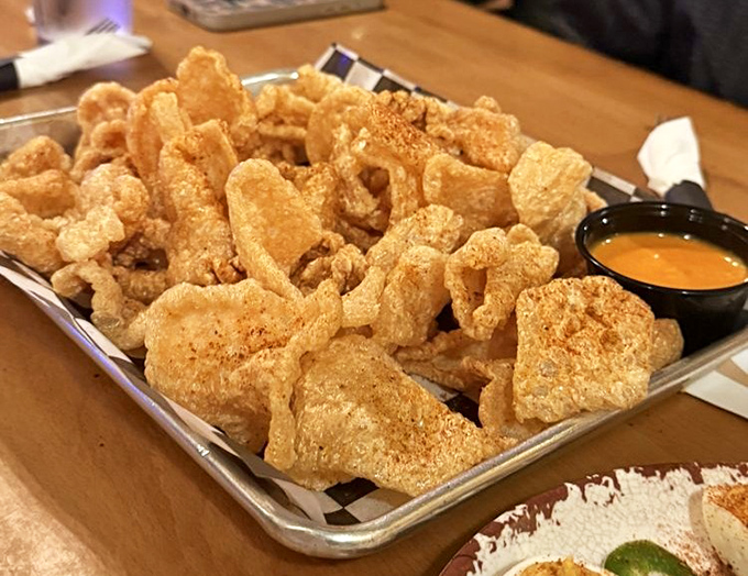 Pork rinds that shatter with a satisfying crunch, dusted with spices that make store-bought versions seem like a sad, distant memory.
