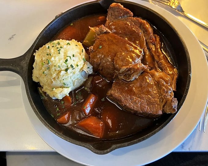 Pot roast served in cast iron&mdash;when comfort food gets dressed up for Sunday dinner but keeps its soul intact.