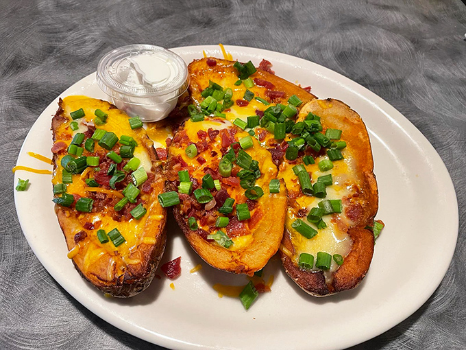 Loaded potato skins &ndash; the 1980s appetizer that refuses to go out of style because, frankly, it doesn't need to. Cheese, bacon, and scallions never get old.