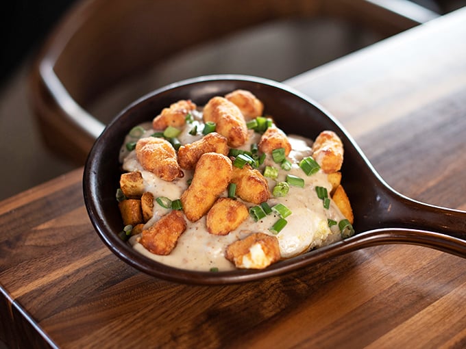 Tater tots and gravy in a skillet&mdash;proof that sometimes the best ideas are the ones that make you wonder why you didn't think of them first.