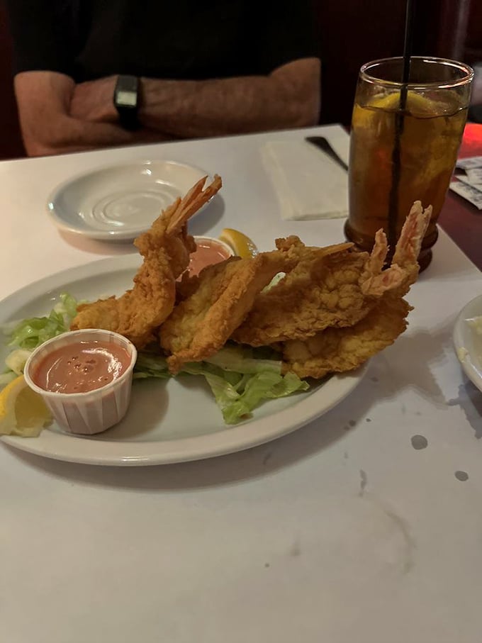 These golden-fried prawns aren't just appetizers &ndash; they're edible exclamation points. Ocean-fresh and begging to be dunked in that sauce.