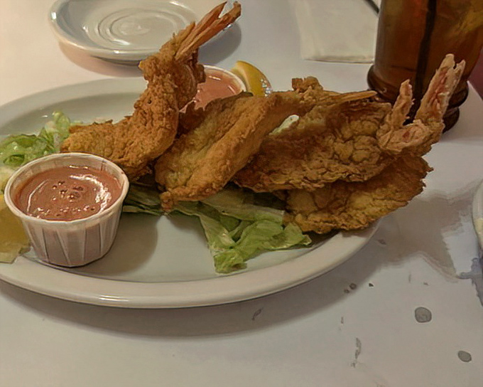 These prawns aren't just fried; they're transformed into golden treasures that make you wonder why you ever considered ordering anything else.