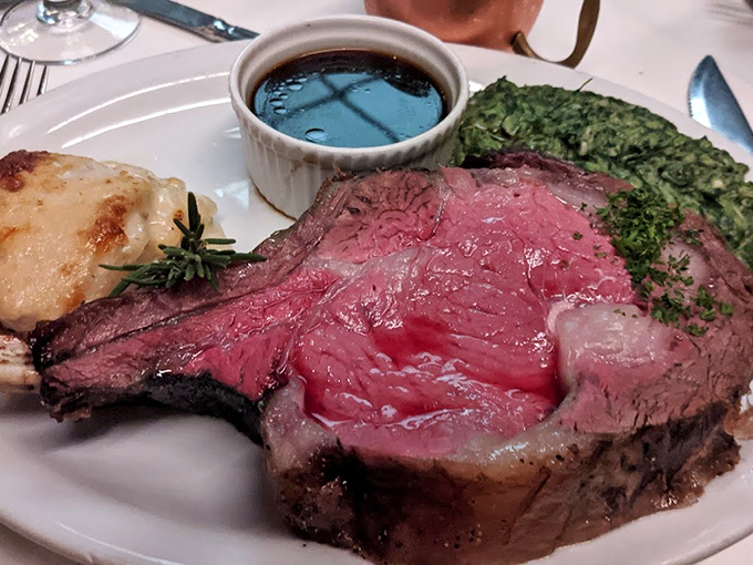 Prime rib so perfectly pink it could make a vegetarian question their life choices, accompanied by a puddle of jus that demands bread-sopping.