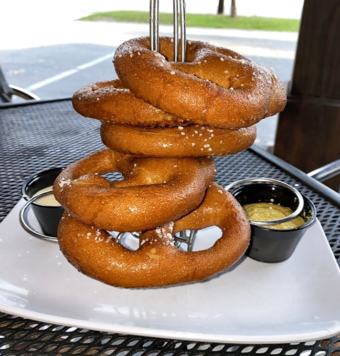 Pub pretzels stacked like delicious golden rings, waiting to be dunked in beer cheese that would make a Bavarian weep with joy.