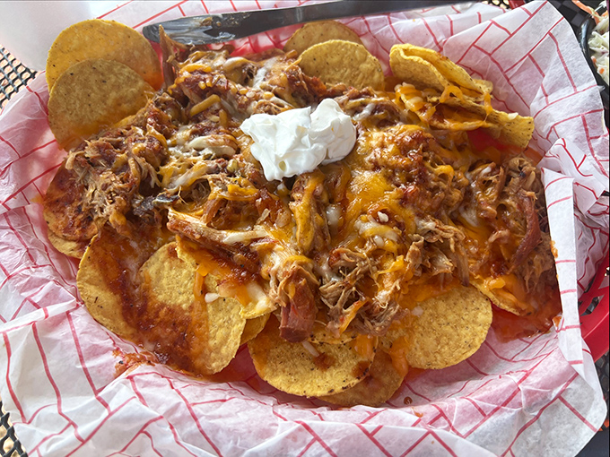 BBQ nachos that blur the line between appetizer and main course&mdash;a mountain of chips, cheese, and pulled pork that demands to be shared but rarely is.