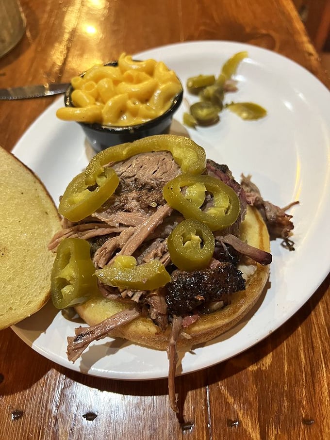A pulled pork sandwich topped with jalape&ntilde;os &ndash; because sometimes paradise needs a little kick to wake up your taste buds.