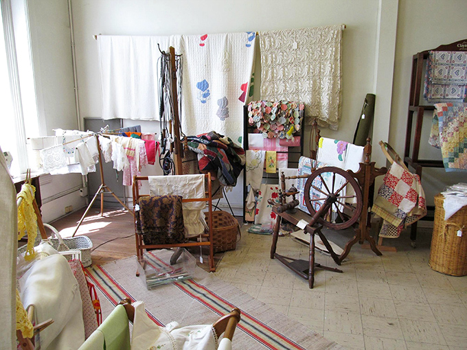 A textile time machine – vintage quilts, handcrafted linens, and a spinning wheel that would make Sleeping Beauty think twice.