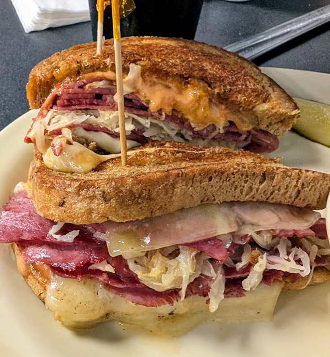 The Reuben sandwich towers like a delicious skyscraper of corned beef and sauerkraut&mdash;architectural perfection between two slices of grilled rye.