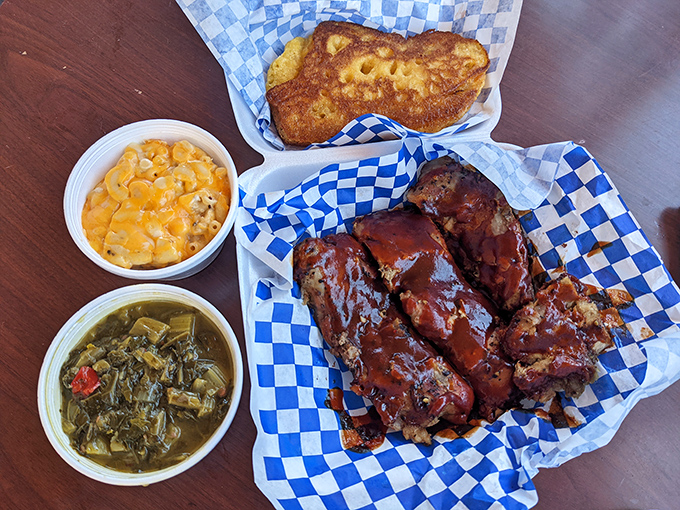 Barbecue ribs glistening with sauce, flanked by mac and cheese and greens&mdash;a plate that doesn't just satisfy hunger but soothes the soul.
