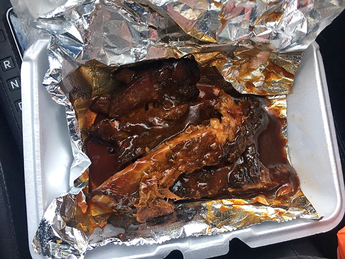 BBQ ribs glistening with sauce that's been perfected over decades. Napkins required, restraint impossible. 