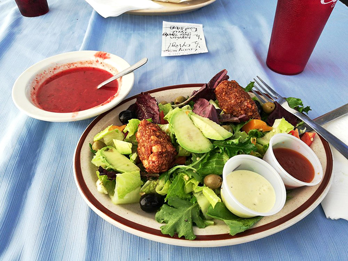 A vibrant salad adorned with falafel and perfectly pink meat proves healthy eating needn't be punishment. Those dipping sauces aren't just accessories&mdash;they're necessities.