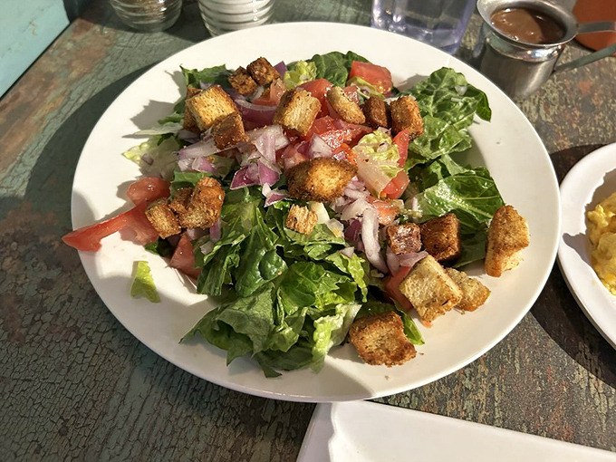 Even the salads here get star treatment&mdash;fresh greens, crispy croutons, and bacon because vegetables deserve good company too.