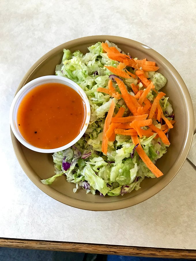 Even the salad gets special treatment here. Fresh, crisp, and colorful &ndash; the perfect counterpoint to all that glorious fried goodness.