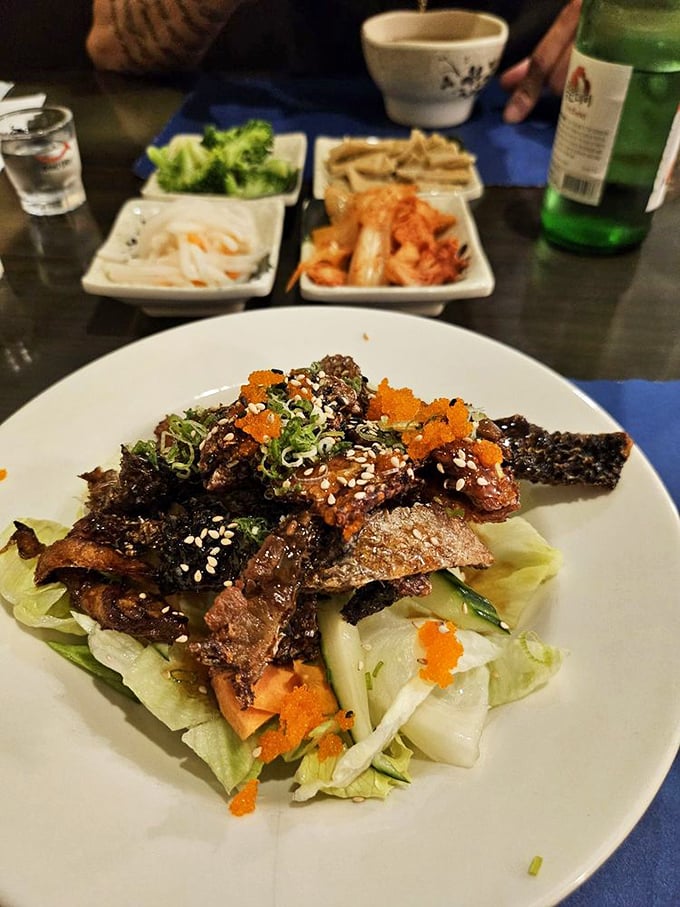 This isn't just any salad &ndash; it's a crunchy, savory celebration topped with beef that's been kissed by fire and sesame.