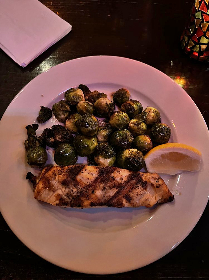 Salmon perfectly grilled alongside Brussels sprouts that even vegetable skeptics would devour &ndash; proof that pub food isn't all about heavy indulgence.