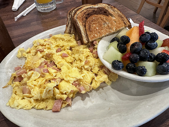 Scrambled eggs and ham that would make Dr. Seuss proud&mdash;comfort on a plate with a side of colorful fruit that makes your doctor happy too.