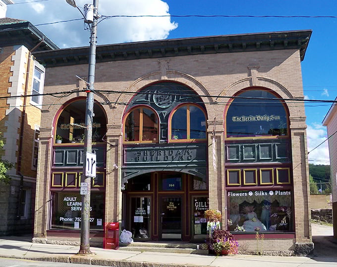 The Sheridan Building's elegant arched windows have witnessed over a century of Berlin's evolving story from mill town to mountain getaway.