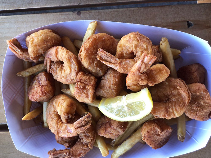 Shrimp and scallops playing dress-up in golden batter&mdash;the seafood equivalent of putting on your Sunday best.