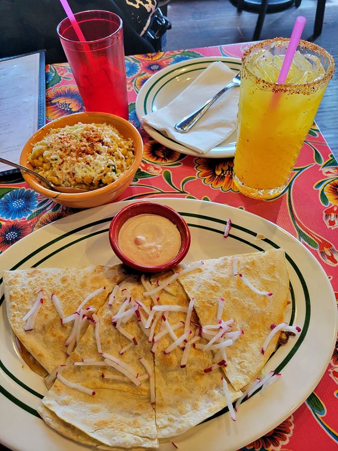 This quesadilla isn't just folded&mdash;it's been tucked in like a cheese-filled bed where radish slivers dream of becoming your next food obsession.