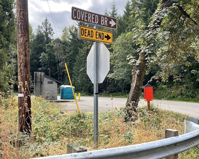 The irony of a "Dead End" sign pointing toward a structure that's survived seven decades isn't lost on those with an appreciation for life's little contradictions.