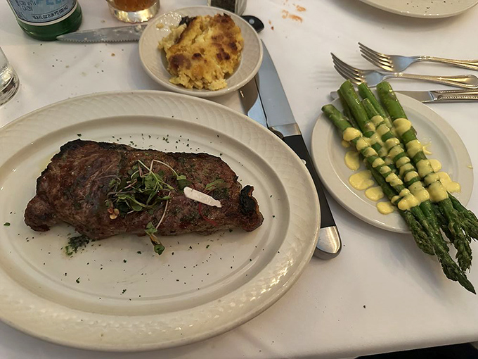 That perfectly cooked sirloin with fresh asparagus looks like it belongs in a steakhouse commercial, except this is gloriously real.