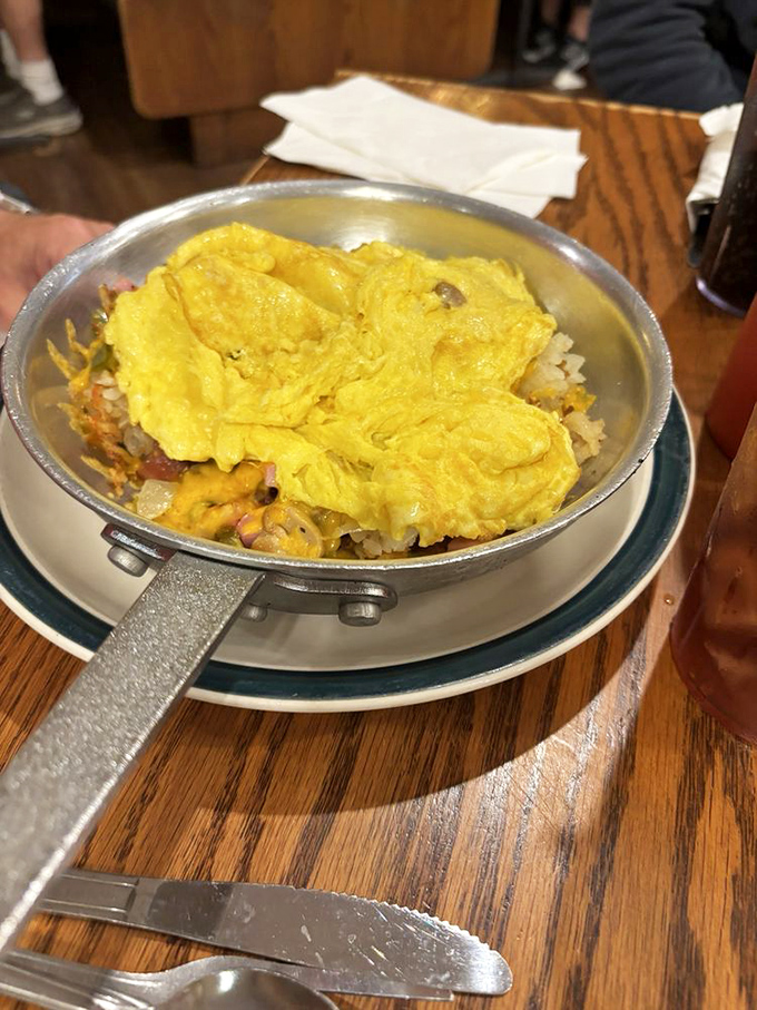 This skillet breakfast is what morning dreams are made of&mdash;eggs lounging atop a bed of potatoes and various breakfast celebrities.