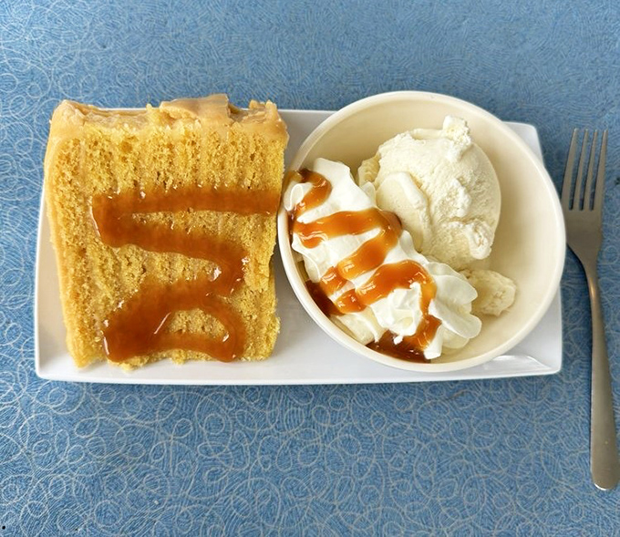 Smith Island Cake &ndash; Maryland's official dessert with layers thinner than excuses for not ordering it. Paired with ice cream, it's the perfect finale.