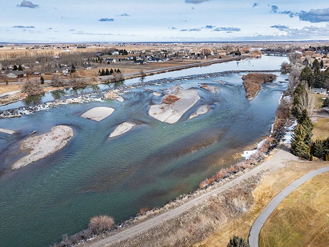 Snake River winding through town like nature's own lazy river, no admission required.