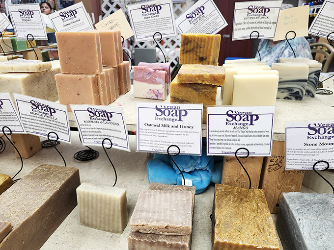 Handcrafted soaps arranged like a confectioner's display, each bar promising to transform your ordinary shower into a spa-like retreat.