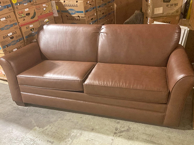 This leather loveseat isn't just pre-loved, it's barely broken in&mdash;like finding a vintage Cadillac with only Sunday drive miles on it.